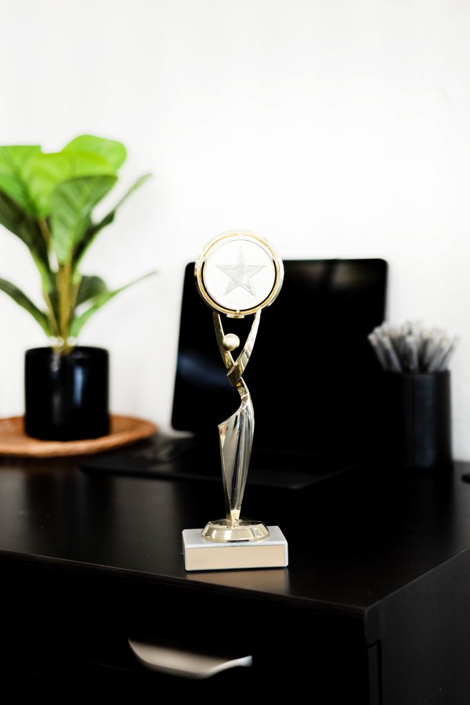 Reach For The Star Spinning Logo Trophy - United Trophy