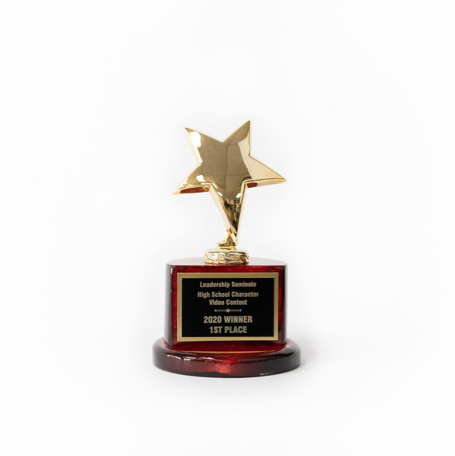 Gold Star on Round Rosewood Base - United Trophy