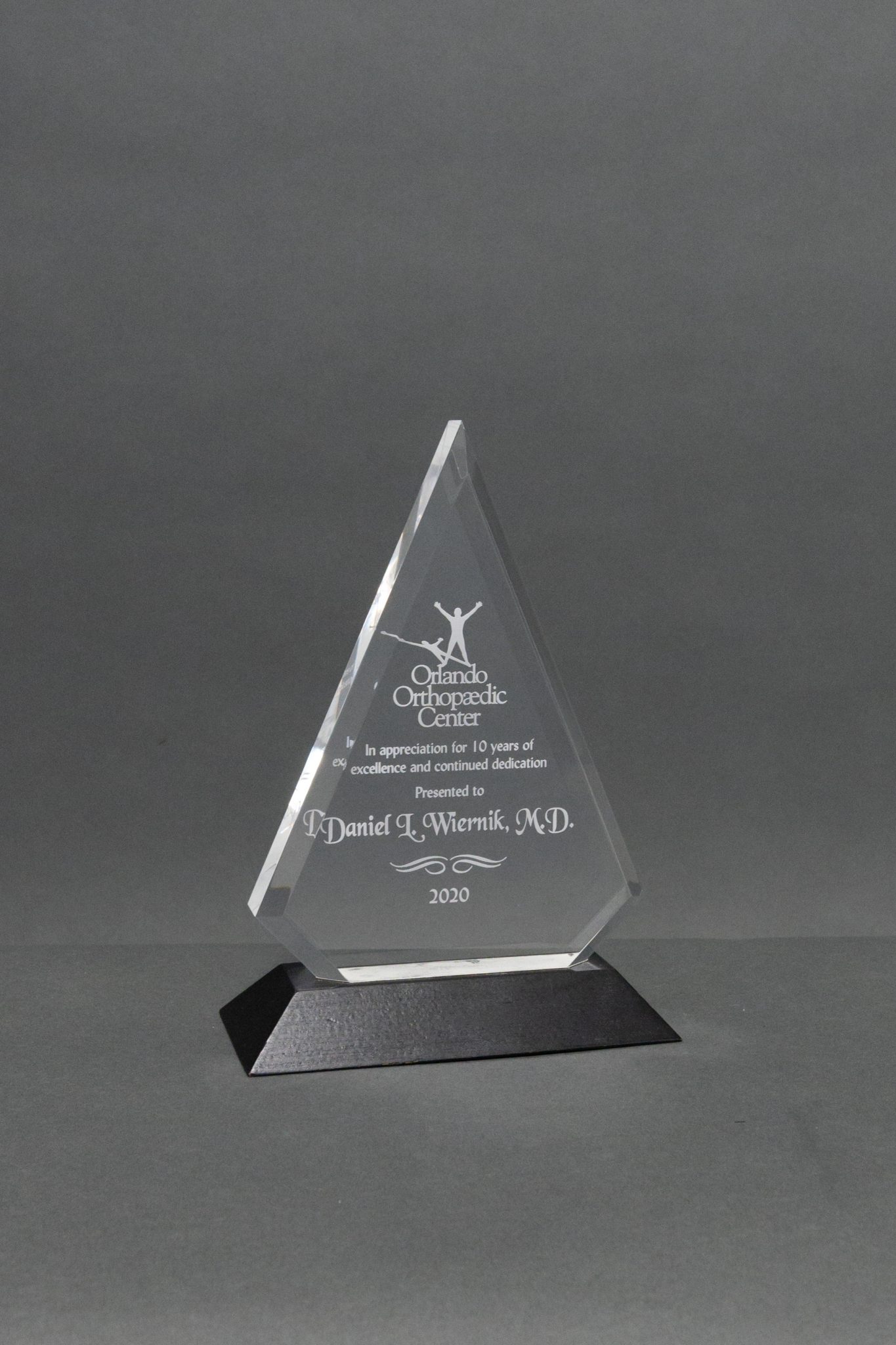 Acrylic Triangle on Black Base - United Trophy